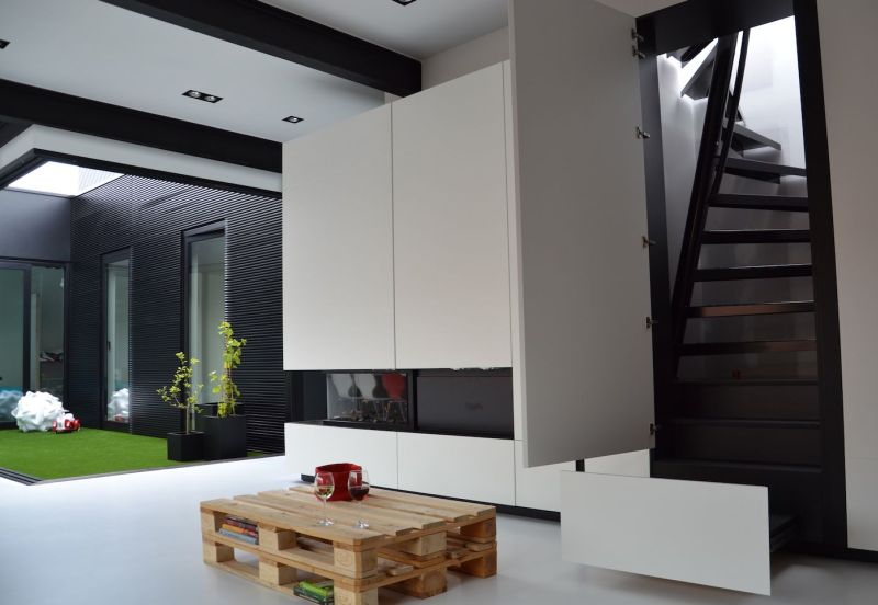 Aeon Architecture transforms old textile factory into a space-saving ...