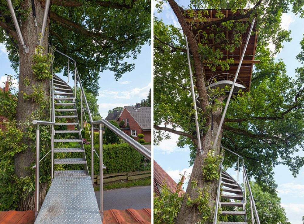 Spiral staircase provides passage to Halle Treehouse by Baumraum - Homecrux