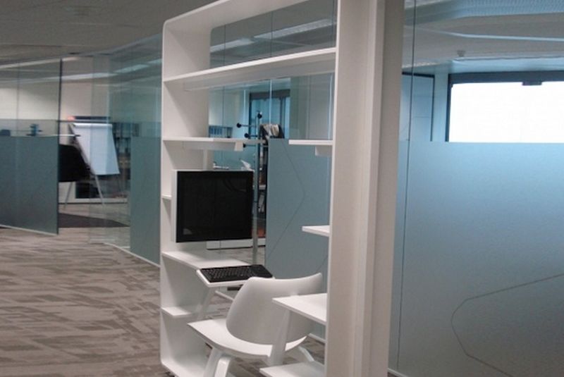 The sleek Cabinet Chair combines a workstation and bookshelves - Home Crux