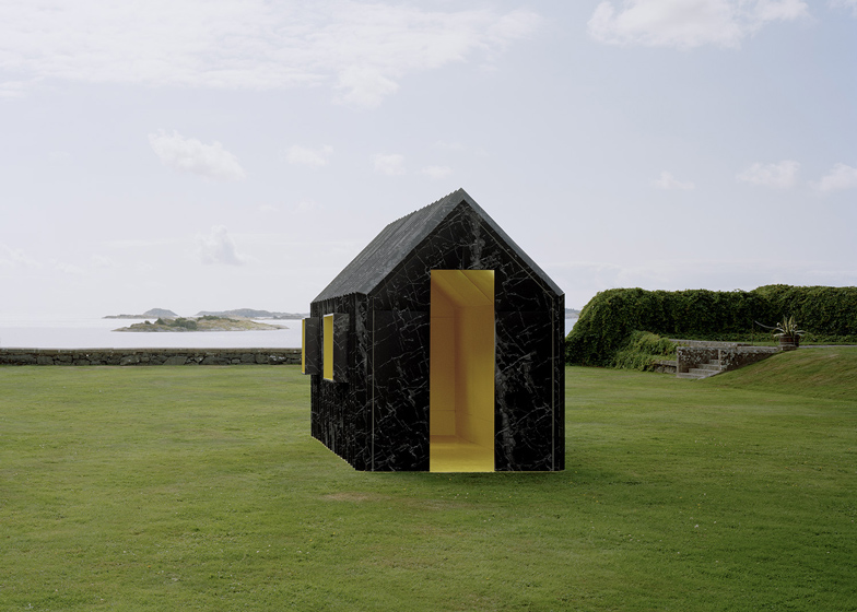 The color changing Chameleon Cabin is made of thick corrugated paper
