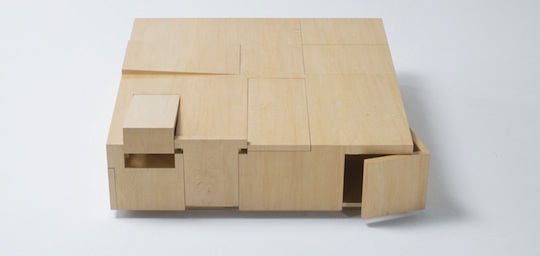 Kai Table functions as a coffee table while offering built-in storage ...