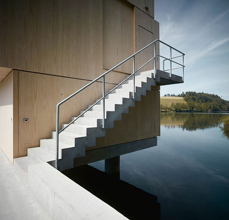 The modernist Lake Rotsee Refuge nestled in a lush setting - Home Crux