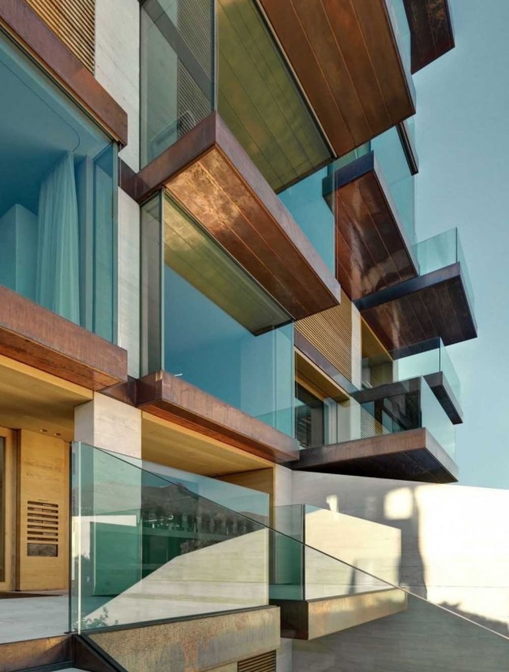 Lomocubes is luxurious building overlooking Lake Lugano in Switzerland ...