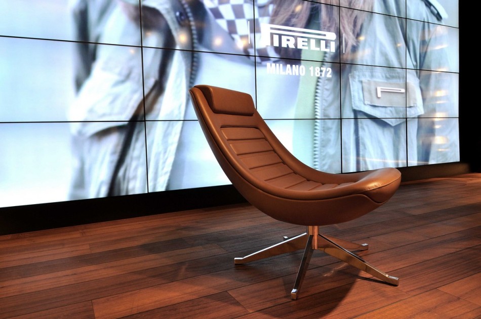 The luxurious Manzu Lounge Chair and Ottoman presented by Alias