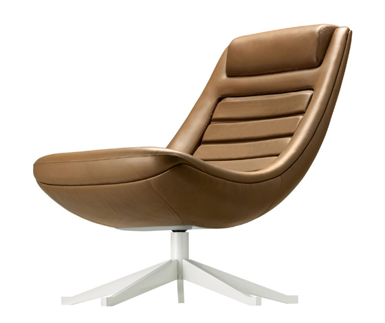 The luxurious Manzu Lounge Chair and Ottoman presented by Alias