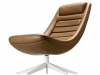 The luxurious Manzu Lounge Chair and Ottoman presented by Alias
