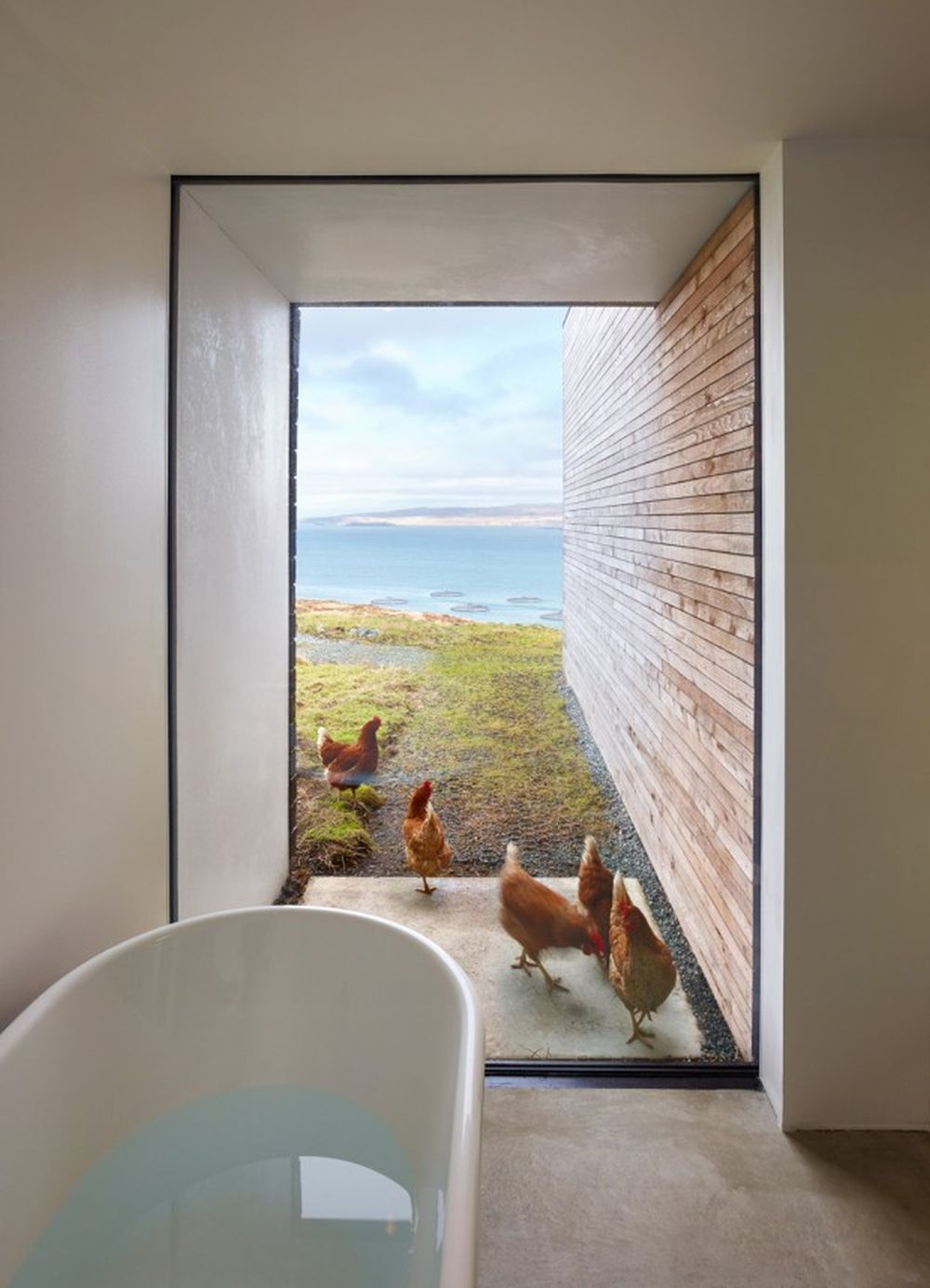 Rectangular wooden house on Isle of Skye by Dualchas Architects - HomeCrux