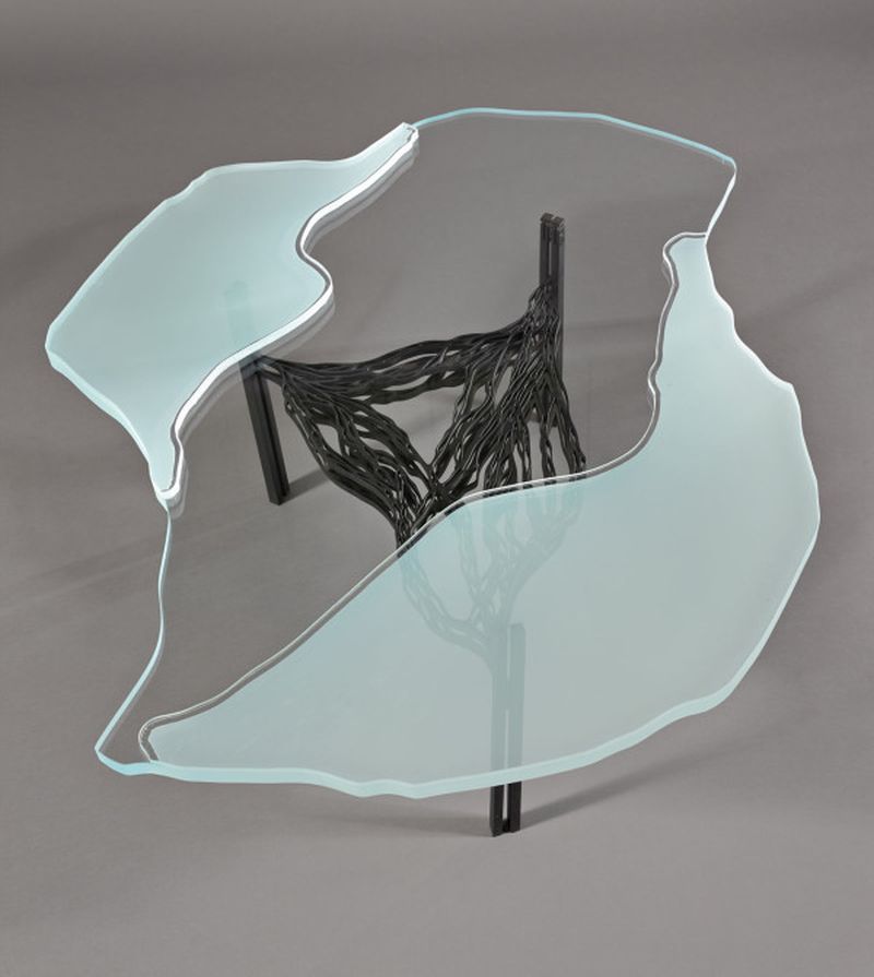 STEN table collection inspired by natural boulders and water - Home Crux