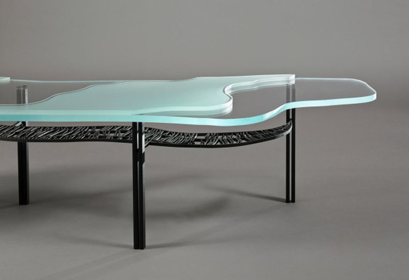 STEN table collection inspired by natural boulders and water - Home Crux