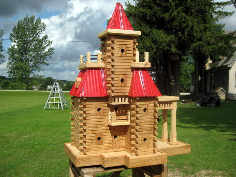 These luxury birdhouses feature fly-through tunnels and swimming pools